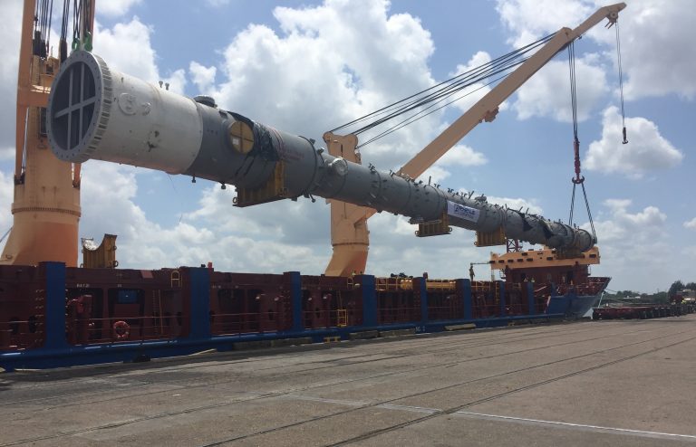 BARNHART HAULS 200-FOOT COLUMN THROUGH HOUSTON