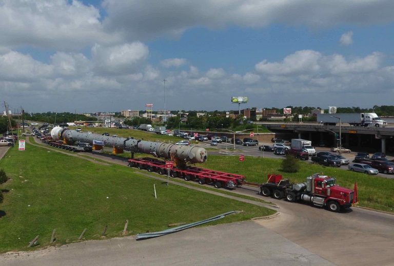 BARNHART HAULS 200-FOOT COLUMN THROUGH HOUSTON